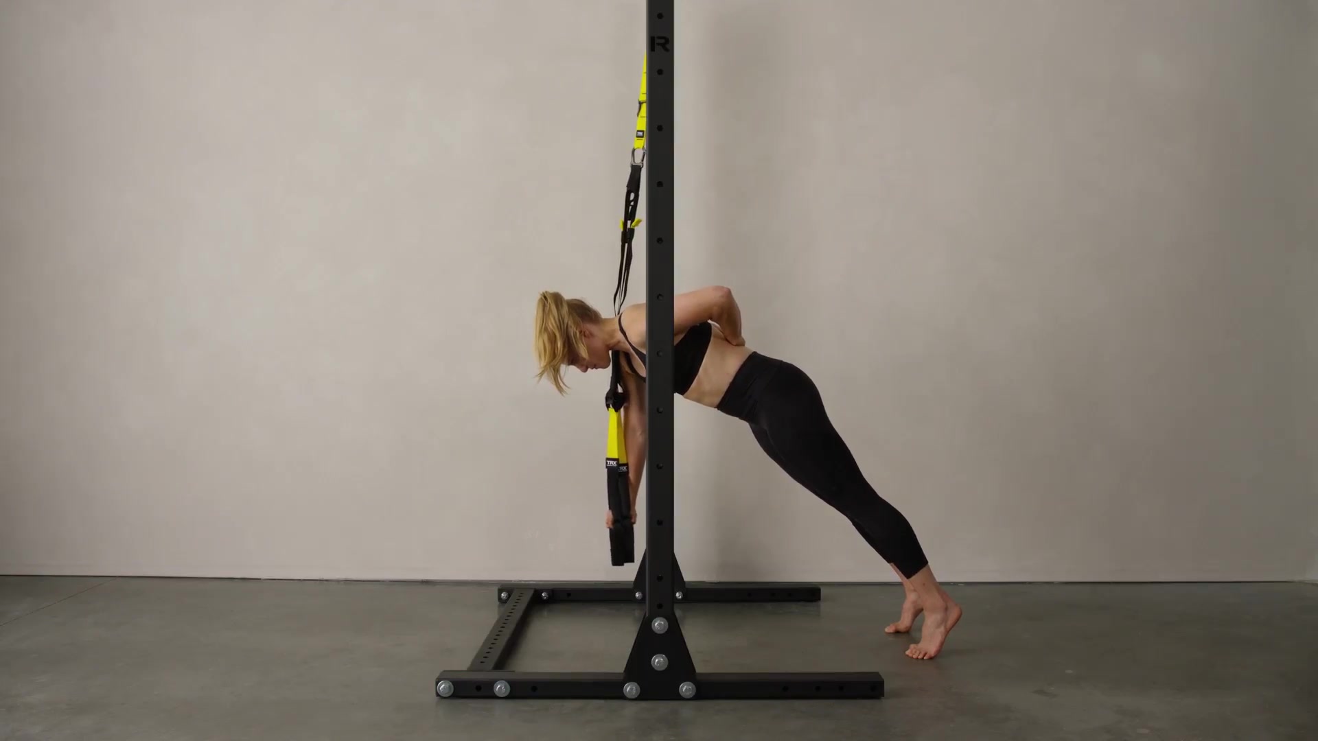 TRX Single Arm Plank - Video, Instructions & Variations